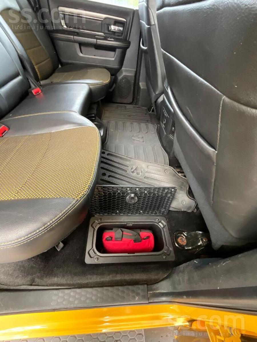 Yellow Dodge RAM 2016 in Riga, with an engine capacity of 5.70 L and mileage of 185 thousand km for 34200 €, photo 12 on AUTOMOTO.COM.LV