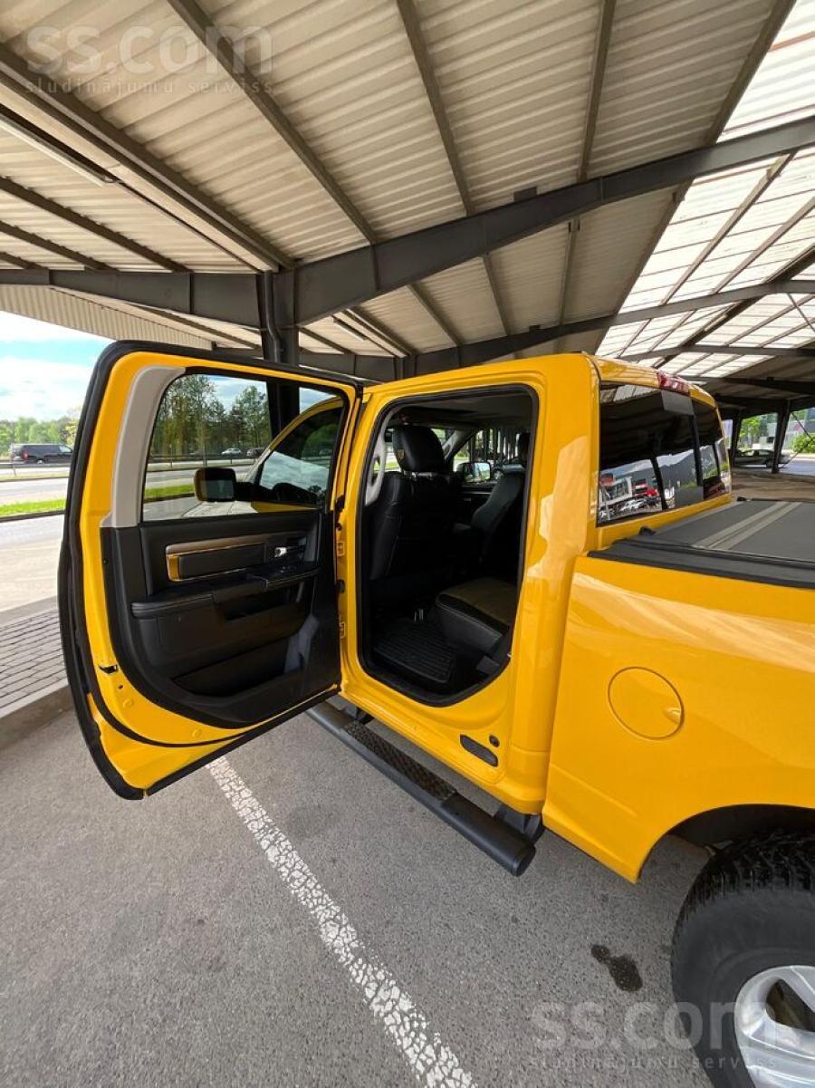 Yellow Dodge RAM 2016 in Riga, with an engine capacity of 5.70 L and mileage of 185 thousand km for 34200 €, photo 15 on AUTOMOTO.COM.LV