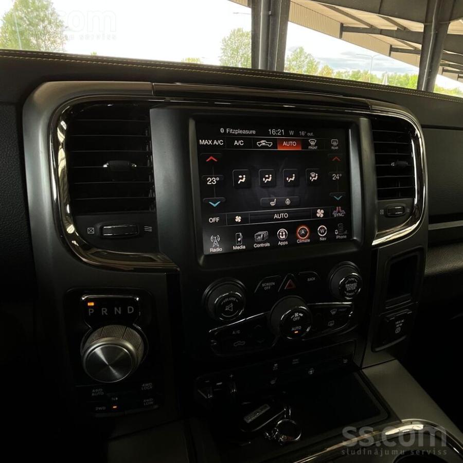 Yellow Dodge RAM 2016 in Riga, with an engine capacity of 5.70 L and mileage of 185 thousand km for 34200 €, photo 32 on AUTOMOTO.COM.LV