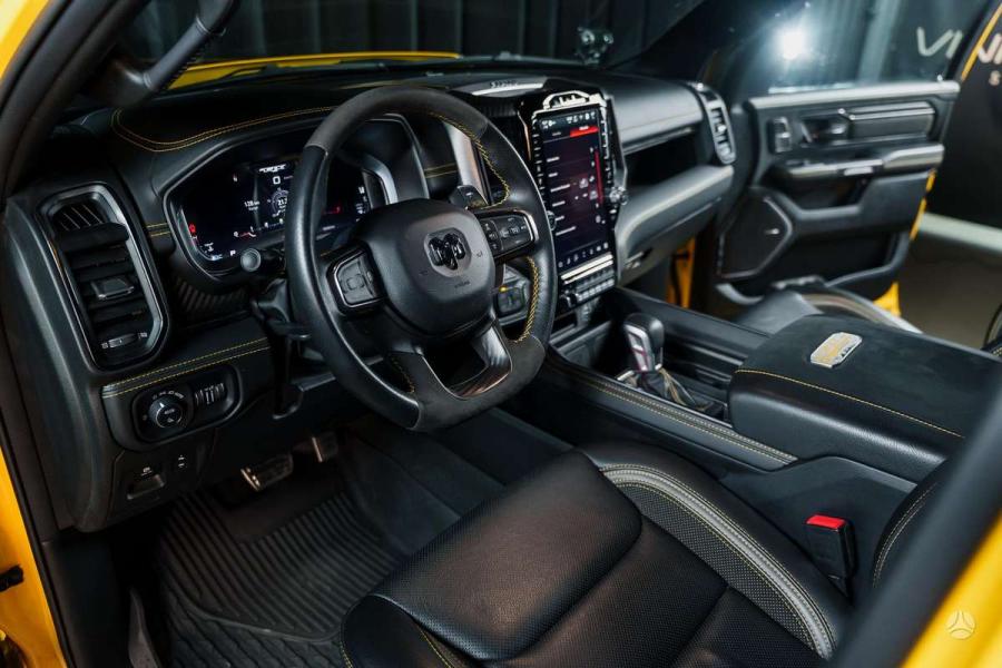 Yellow Dodge RAM 2023 in Vilnius, with an engine capacity of 6.16 L and mileage of 16 thousand km for 119999 €, photo 26 on AUTOMOTO.COM.LV