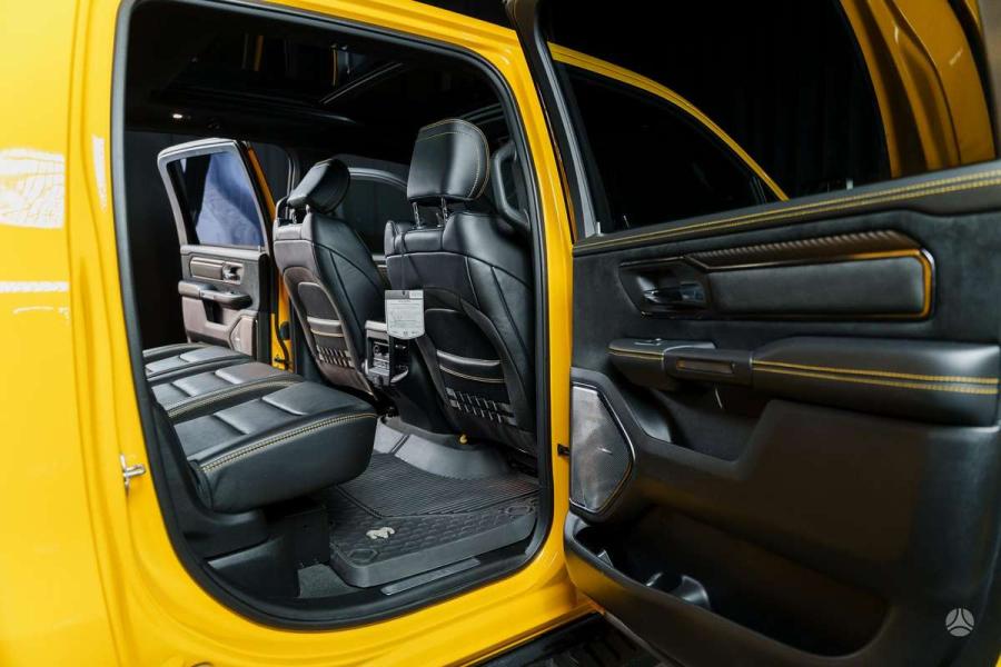Yellow Dodge RAM 2023 in Vilnius, with an engine capacity of 6.16 L and mileage of 16 thousand km for 119999 €, photo 40 on AUTOMOTO.COM.LV