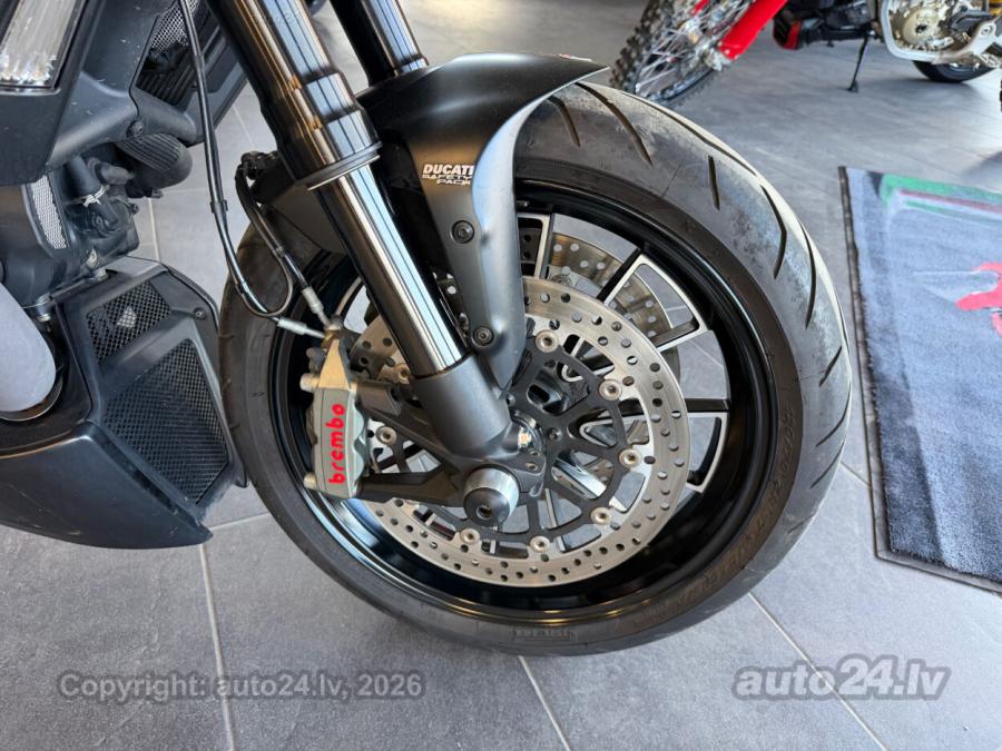 Melns Ducati Diavel 2015 Tallina, ar dzinēja tilpumu 1.20 L un nobraukumu 9 tūkst. km par 10490 €, foto 10 vietnē AUTOMOTO.COM.LV