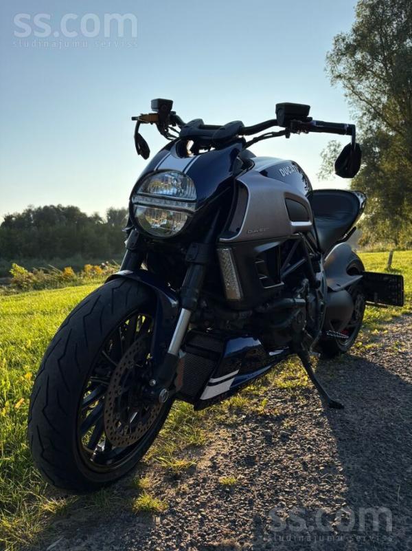Дукати Diavel 2013 в Рига на AUTOMOTO.COM.LV Дукати Diavel 2013 в Рига, объемом двигателя 1.20 л и пробегом 0 тыс. км за 9500 €, фото 3 на AUTOMOTO.COM.LV