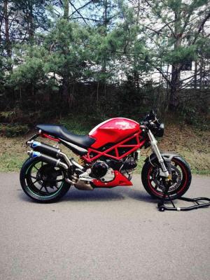 Red Ducati Monster 2009 in Kaunas, with an engine capacity of 0.99 L and mileage of 29 thousand km for 3250 €, photo  on AUTOMOTO.COM.LV