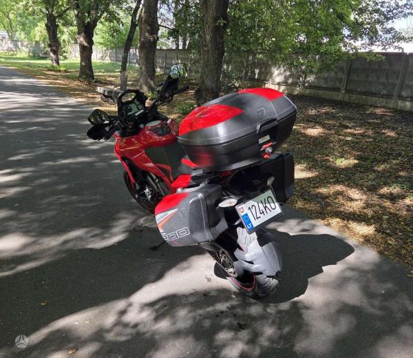 Sarkans Ducati Multistrada 2012 Panevēža, ar dzinēja tilpumu 1.20 L un nobraukumu 53 tūkst. km par 6800 €, foto 5 vietnē AUTOMOTO.COM.LV