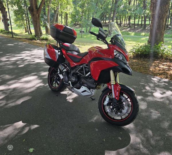Sarkans Ducati Multistrada 2012 Panevēža, ar dzinēja tilpumu 1.20 L un nobraukumu 53 tūkst. km par 6800 €, foto 7 vietnē AUTOMOTO.COM.LV