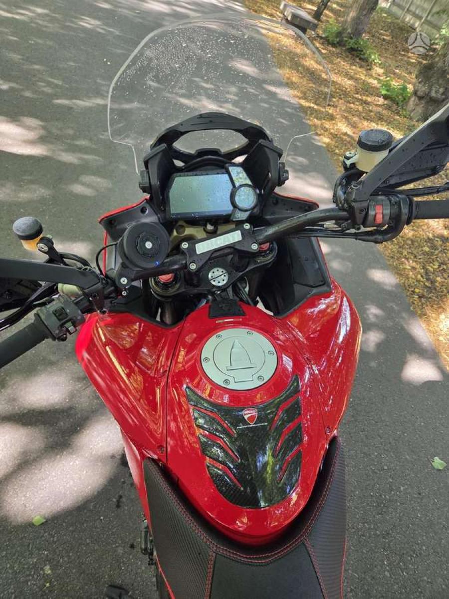 Sarkans Ducati Multistrada 2012 Panevēža, ar dzinēja tilpumu 1.20 L un nobraukumu 53 tūkst. km par 6800 €, foto 12 vietnē AUTOMOTO.COM.LV