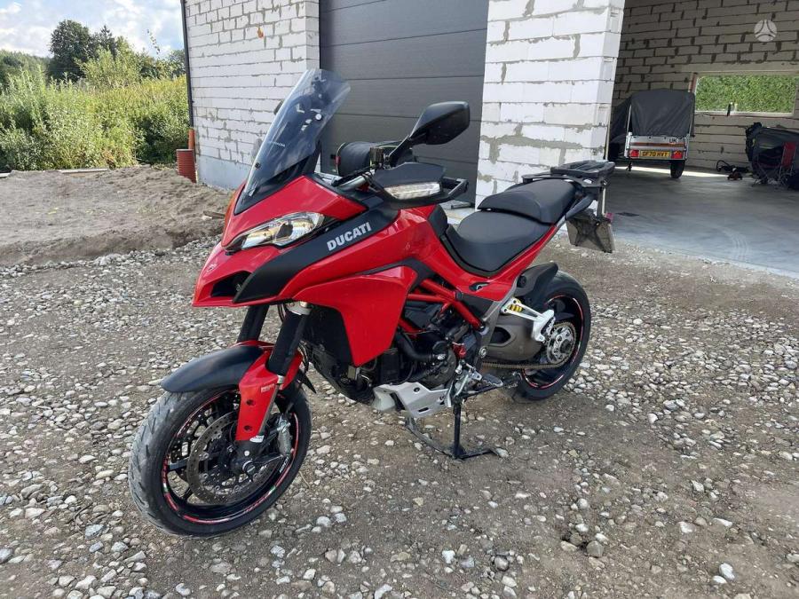 Sarkans Ducati Multistrada 2015 Kazlų Rūda, ar dzinēja tilpumu 1.20 L un nobraukumu 41 tūkst. km par 7000 €, foto 1 vietnē AUTOMOTO.COM.LV
