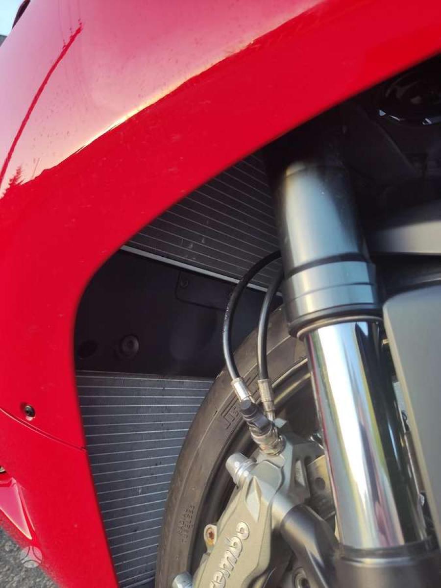 Red Ducati Panigale 2022 in Panevezys, with an engine capacity of 0.96 L and mileage of 6 thousand km for 11500 €, photo 19 on AUTOMOTO.COM.LV
