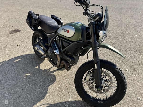 Zaļš Ducati Scrambler 2015 Viļņa, ar dzinēja tilpumu 0.80 L un nobraukumu 26 tūkst. km par 4100 €, foto 1 vietnē AUTOMOTO.COM.LV