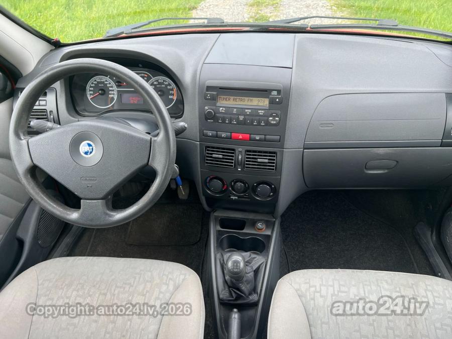 Red Fiat Albea 2008 in Tallinn, with an engine capacity of 1.40 L and mileage of 125 thousand km for 990 €, photo 6 on AUTOMOTO.COM.LV