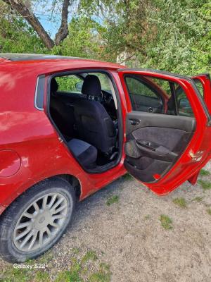 Red Fiat Bravo 2007 in Siauliai, with an engine capacity of 1.91 L and mileage of 248 thousand km for 1300 €, photo 4 on AUTOMOTO.COM.LV