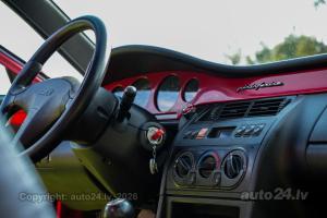 Sarkans Fiat Coupe 1995 Tallina, ar dzinēja tilpumu 2.00 L un nobraukumu 196 tūkst. km par 5500 €, foto 18 vietnē AUTOMOTO.COM.LV