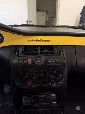 Dzeltens Fiat Coupe 1998 Viļņa, ar dzinēja tilpumu 1.75 L un nobraukumu 180 tūkst. km par 5800 €, foto 13 vietnē AUTOMOTO.COM.LV