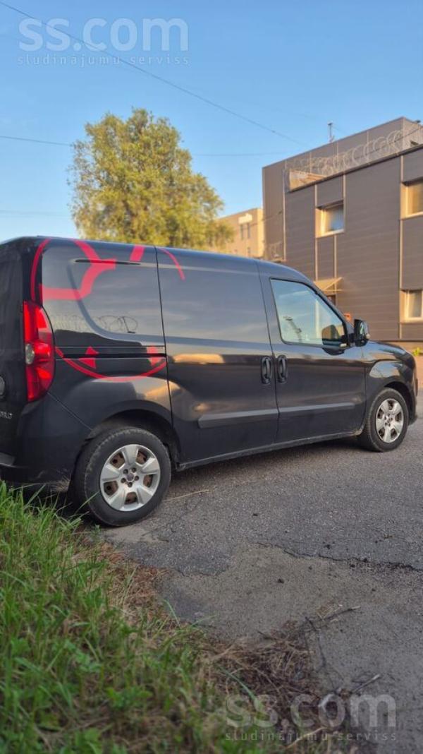 Black Fiat Doblo 2010 in Riga, with an engine capacity of 1.30 L and mileage of 360 thousand km for 1750 €, photo 2 on AUTOMOTO.COM.LV