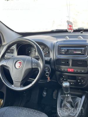 Brown Fiat Doblo 2013 in Talsi, with an engine capacity of 2.00 L and mileage of 319 thousand km for 2195 €, photo 6 on AUTOMOTO.COM.LV