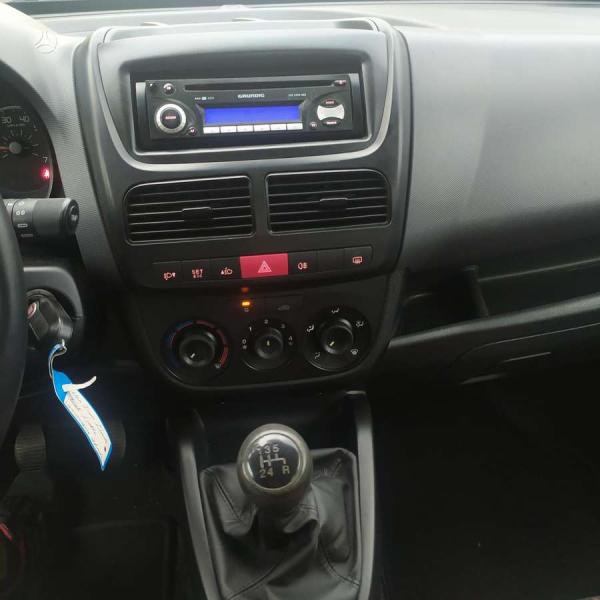 Red Fiat Doblo 2013 in Birzai, with an engine capacity of 1.37 L and mileage of 214 thousand km for 3650 €, photo 4 on AUTOMOTO.COM.LV