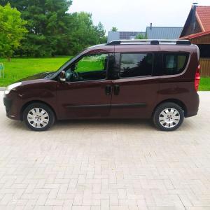 Red Fiat Doblo 2013 in Birzai, with an engine capacity of 1.37 L and mileage of 214 thousand km for 3650 €, photo 7 on AUTOMOTO.COM.LV
