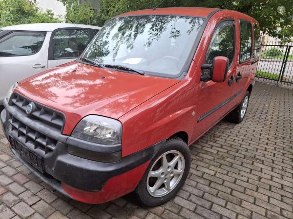 Sarkans Fiat Doblo 2005 Viļņa, ar dzinēja tilpumu 1.25 L un nobraukumu 240 tūkst. km par 2000 €, foto 1 vietnē AUTOMOTO.COM.LV