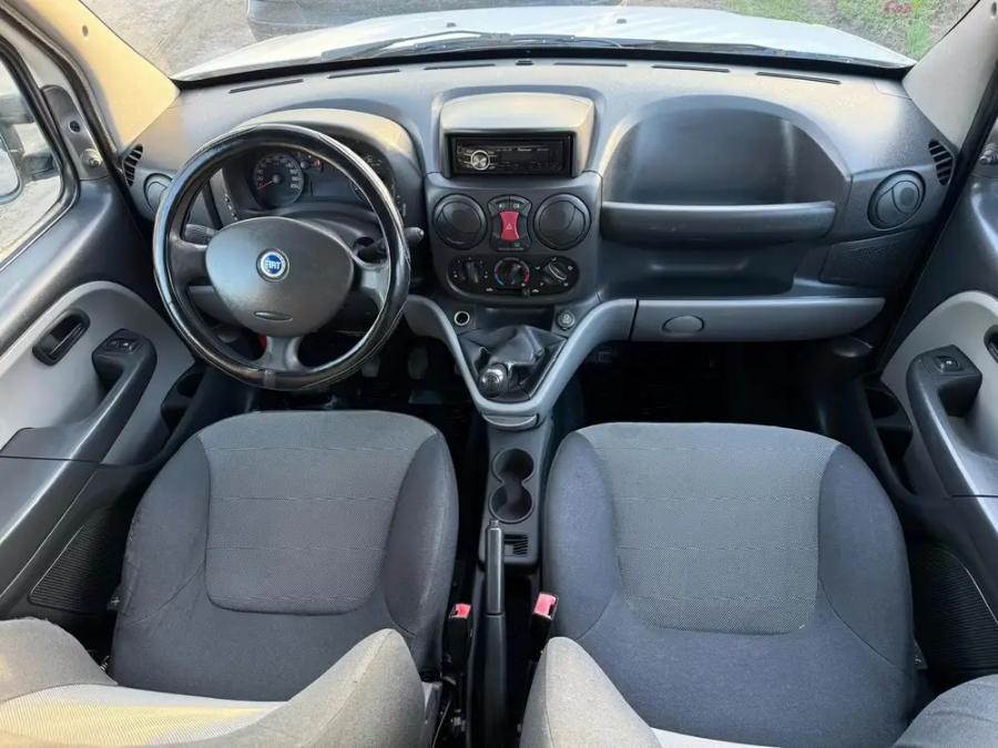 White Fiat Doblo 2008 in Riga, with an engine capacity of 1.30 L and mileage of 380 thousand km for 2300 €, photo 9 on AUTOMOTO.COM.LV