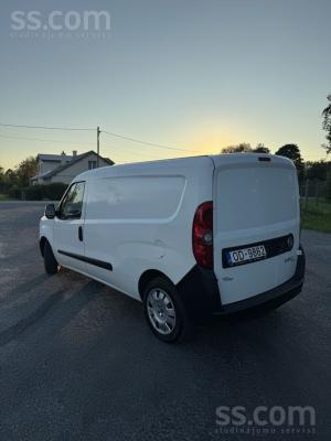 White Fiat Doblo 2014 in Riga, with an engine capacity of 1.60 L and mileage of 215 thousand km for 3750 €, photo 4 on AUTOMOTO.COM.LV