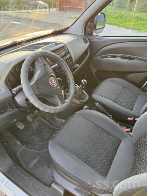 White Fiat Doblo 2014 in Riga, with an engine capacity of 1.60 L and mileage of 215 thousand km for 3750 €, photo 6 on AUTOMOTO.COM.LV