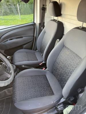 White Fiat Doblo 2014 in Riga, with an engine capacity of 1.60 L and mileage of 215 thousand km for 3750 €, photo 7 on AUTOMOTO.COM.LV