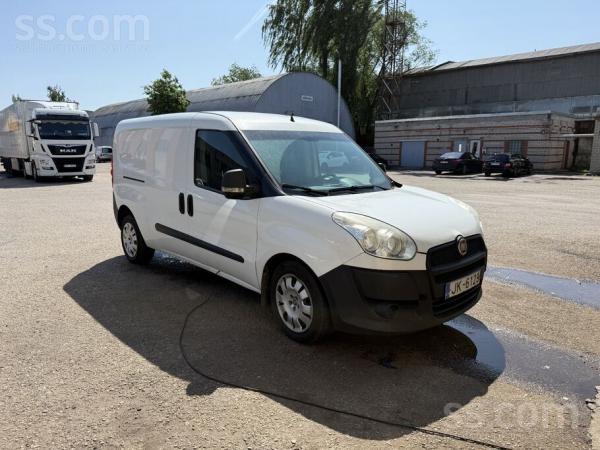 White Fiat Doblo 2013 in Riga, with an engine capacity of 1.60 L and mileage of 299 thousand km for 1750 €, photo 4 on AUTOMOTO.COM.LV