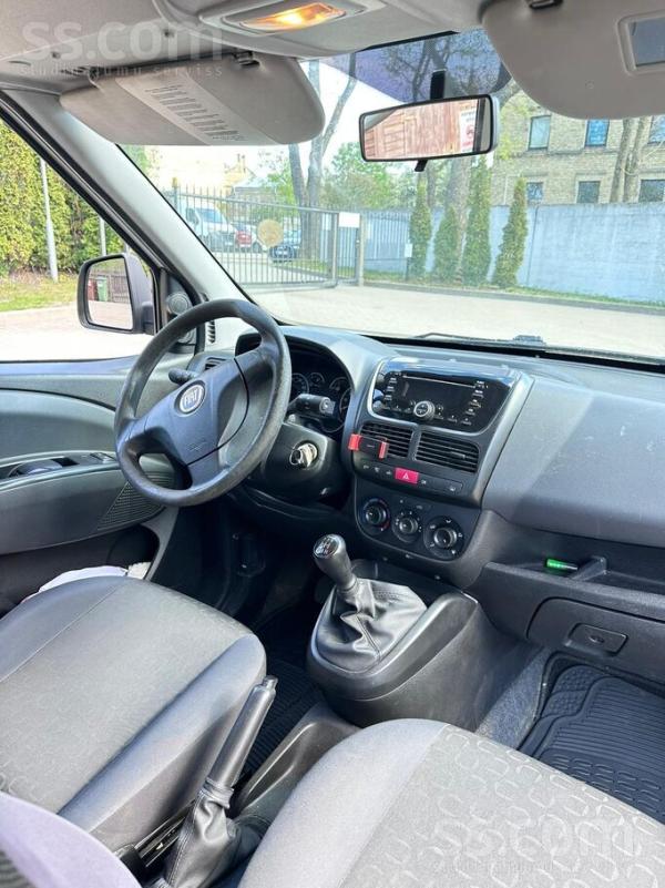 White Fiat Doblo 2014 in Riga, with an engine capacity of 1.30 L and mileage of 209 thousand km for 1800 €, photo 3 on AUTOMOTO.COM.LV