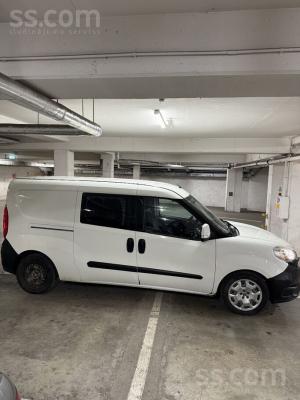 White Fiat Doblo 2016 in Liepaja, with an engine capacity of 1.60 L and mileage of 230 thousand km for 5200 €, photo 3 on AUTOMOTO.COM.LV