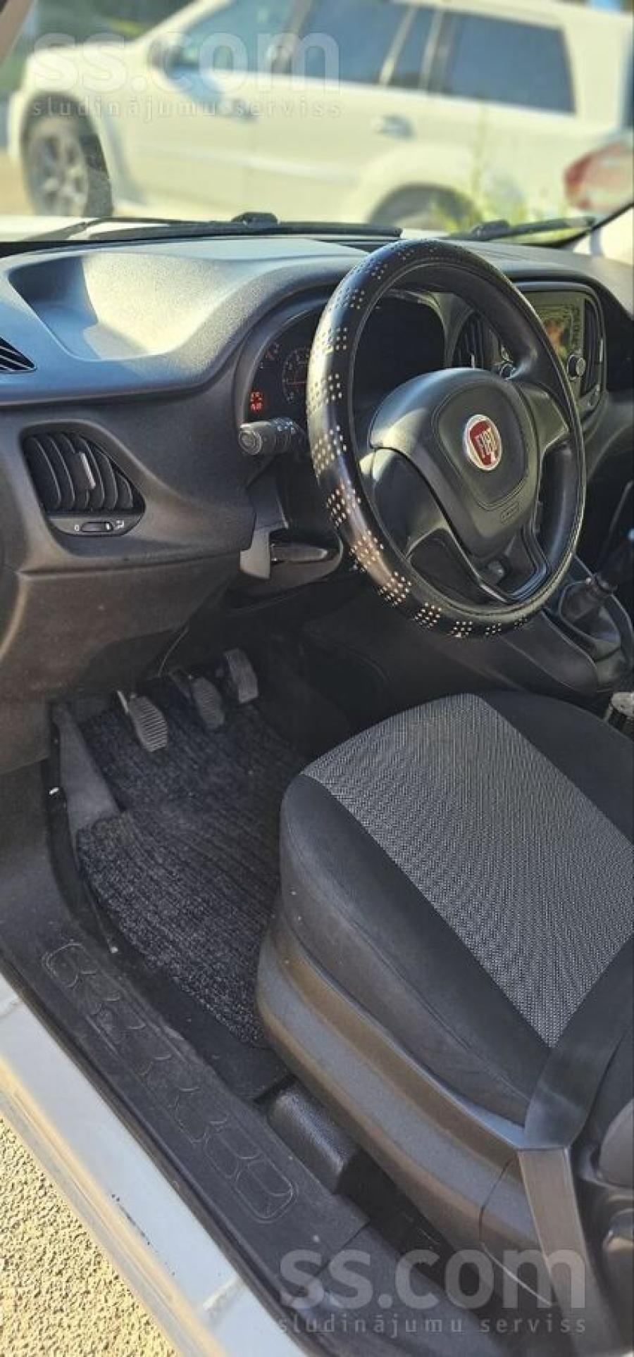 White Fiat Doblo 2018 in Riga, with an engine capacity of 1.30 L and mileage of 248 thousand km for 6100 €, photo 15 on AUTOMOTO.COM.LV