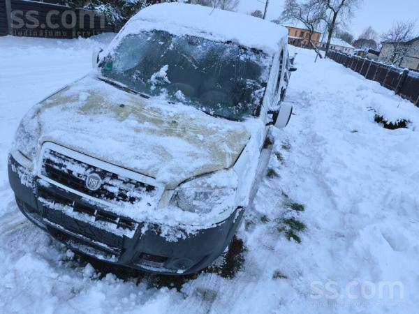 White Fiat Doblo 2009 in Liepaja, with an engine capacity of 1.30 L and mileage of 203 thousand km for 1750 €, photo 1 on AUTOMOTO.COM.LV