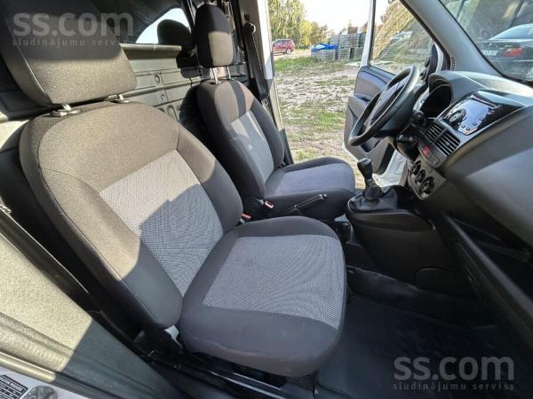 White Fiat Doblo 2015 in Riga, with an engine capacity of 1.30 L and mileage of 122 thousand km for 4500 €, photo 10 on AUTOMOTO.COM.LV