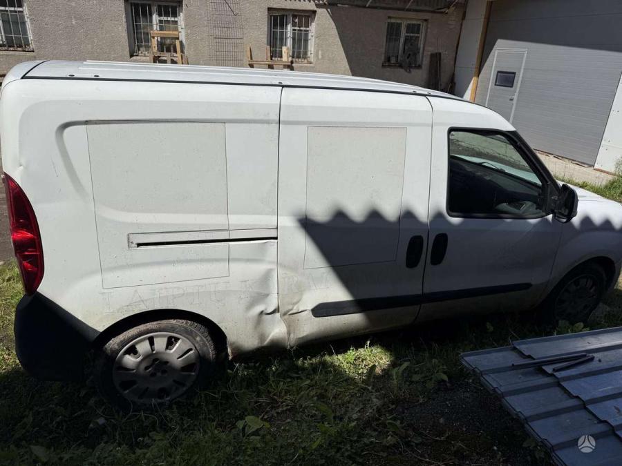 White Fiat Doblo 2013 in Kaunas, with an engine capacity of 1.25 L and mileage of 301 thousand km for 1000 €, photo 1 on AUTOMOTO.COM.LV
