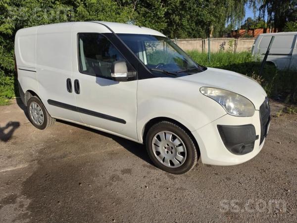 White Fiat Doblo 2013 in Riga, with an engine capacity of 1.40 L and mileage of 91 thousand km for 4470 €, photo 1 on AUTOMOTO.COM.LV