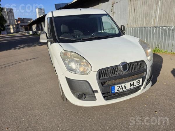 White Fiat Doblo 2013 in Riga, with an engine capacity of 1.40 L and mileage of 91 thousand km for 4470 €, photo 3 on AUTOMOTO.COM.LV