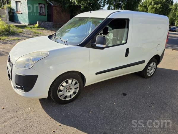 White Fiat Doblo 2013 in Riga, with an engine capacity of 1.40 L and mileage of 91 thousand km for 4470 €, photo 5 on AUTOMOTO.COM.LV