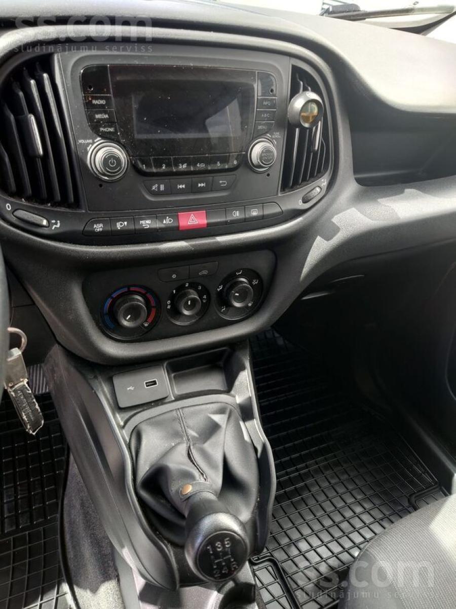 White Fiat Doblo 2020 in Riga, with an engine capacity of 1.30 L and mileage of 236 thousand km for 6700 €, photo 12 on AUTOMOTO.COM.LV