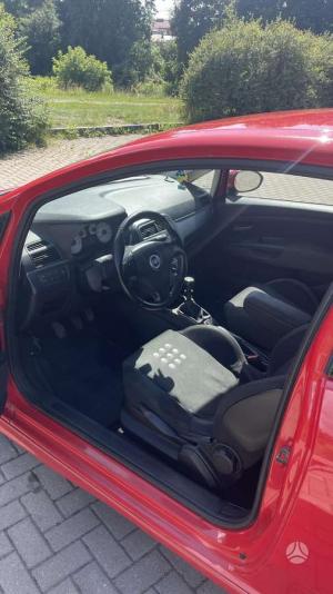 Red Fiat Grande Punto 2007 in Vilnius, with an engine capacity of 1.30 L and mileage of 300 thousand km for 600 €, photo 7 on AUTOMOTO.COM.LV