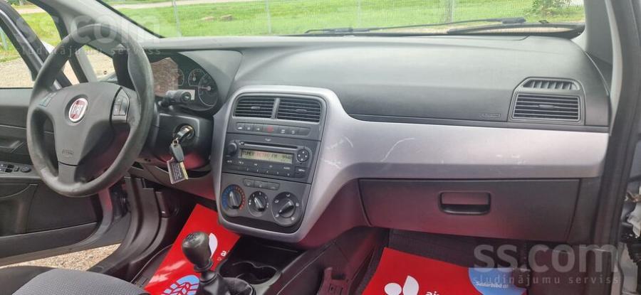 Grey Fiat Punto 2011 in Daugavpils, with an engine capacity of 1.20 L and mileage of 191 thousand km for 2950 €, photo 24 on AUTOMOTO.COM.LV
