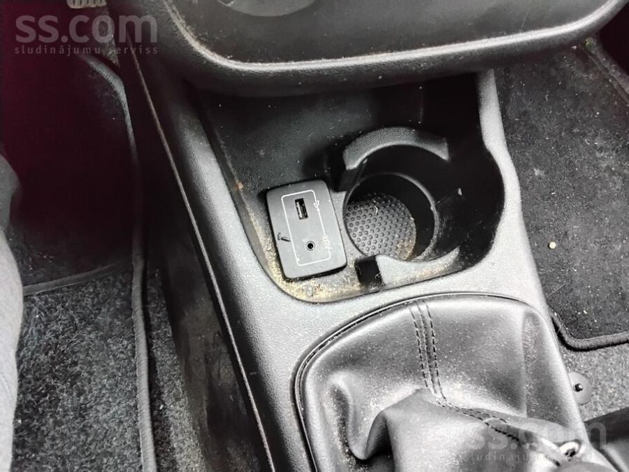 Grey Fiat Punto 2015 in Riga, with an engine capacity of 1.30 L and mileage of 255 thousand km for 3737 €, photo 12 on AUTOMOTO.COM.LV