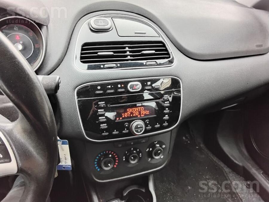 Grey Fiat Punto 2015 in Riga, with an engine capacity of 1.30 L and mileage of 255 thousand km for 3737 €, photo 15 on AUTOMOTO.COM.LV
