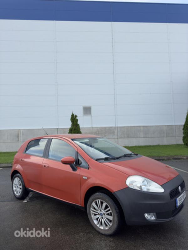 Orange Fiat Punto 2006 in Narva, with an engine capacity of 1.40 L and mileage of 150 thousand km for 900 €, photo 1 on AUTOMOTO.COM.LV