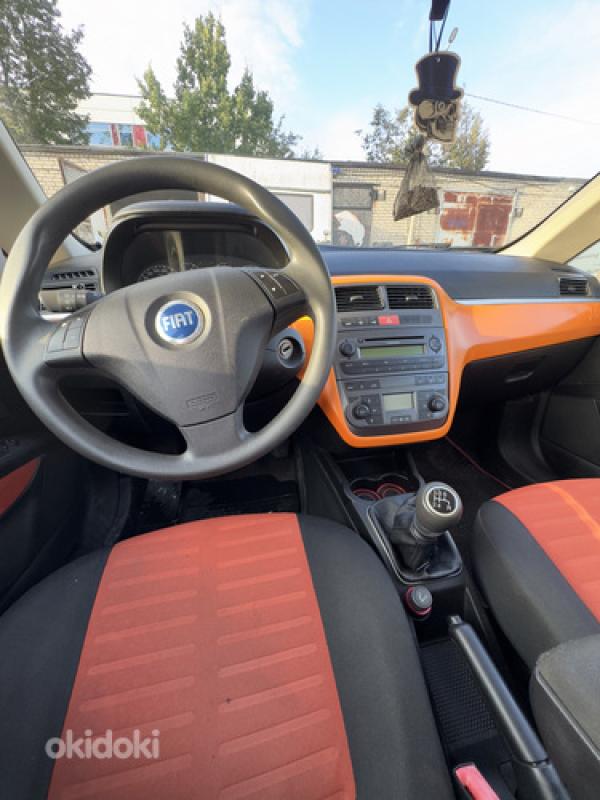 Orange Fiat Punto 2006 in Narva, with an engine capacity of 1.40 L and mileage of 150 thousand km for 900 €, photo 5 on AUTOMOTO.COM.LV