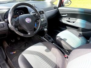 Red Fiat Punto 2007 in Tallinn, with an engine capacity of 1.40 L and mileage of 250 thousand km for 1199 €, photo 20 on AUTOMOTO.COM.LV