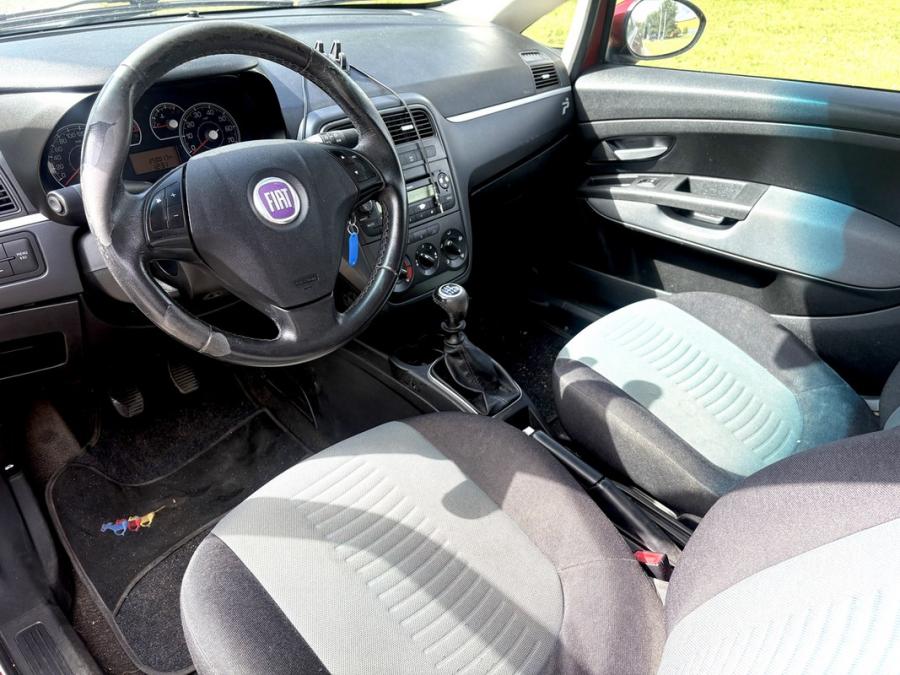 Red Fiat Punto 2007 in Tallinn, with an engine capacity of 1.40 L and mileage of 250 thousand km for 1199 €, photo 20 on AUTOMOTO.COM.LV