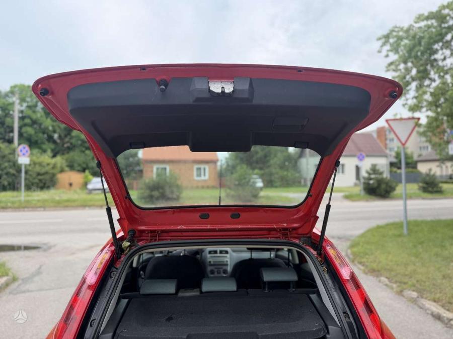 Red Fiat Punto 2009 in Kaunas, with an engine capacity of 1.25 L and mileage of 255 thousand km for 999 €, photo 12 on AUTOMOTO.COM.LV