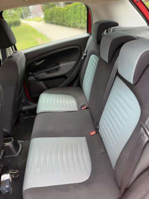 Red Fiat Punto 2009 in Kaunas, with an engine capacity of 1.25 L and mileage of 255 thousand km for 999 €, photo 17 on AUTOMOTO.COM.LV