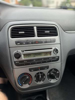 Red Fiat Punto 2009 in Kaunas, with an engine capacity of 1.25 L and mileage of 255 thousand km for 999 €, photo 28 on AUTOMOTO.COM.LV