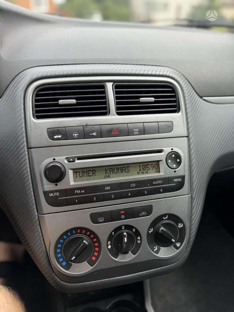 Red Fiat Punto 2009 in Kaunas, with an engine capacity of 1.25 L and mileage of 255 thousand km for 999 €, photo 28 on AUTOMOTO.COM.LV